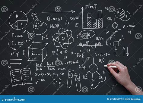 Blackboard With Hand Written Scientific Formulas And Math Calculations