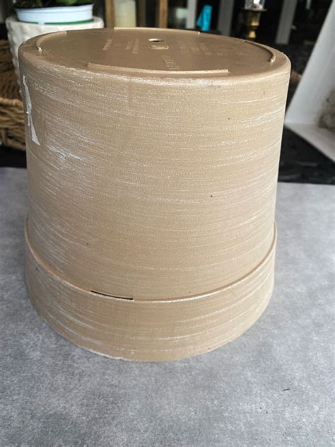 Give Plastic Planters A Patina With Paint