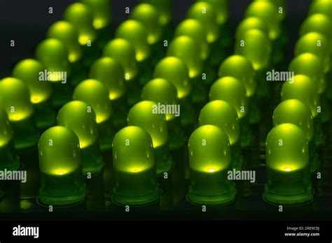 Closeup Of Several Leds Through Hole The Green Colour On Table In Dim