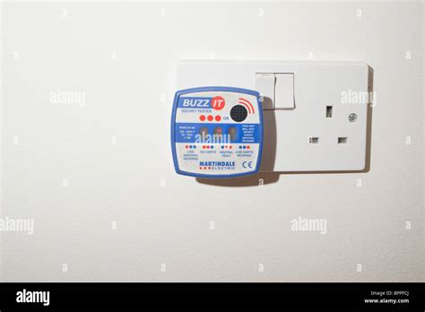 A Buzz It Socket Tester Used By An Electrician For Testing Faults In Electrical Systems Stock