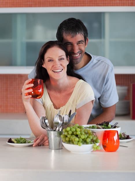 Premium Photo Intimate Couple Standing In The Kitchen