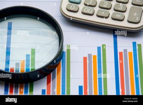 Graph Analysis With Calculator And Magnifying Glass Financial Analysis