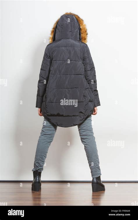 Back View Of Young Fashionable Girl Wearing Jacket With Hood Fashion