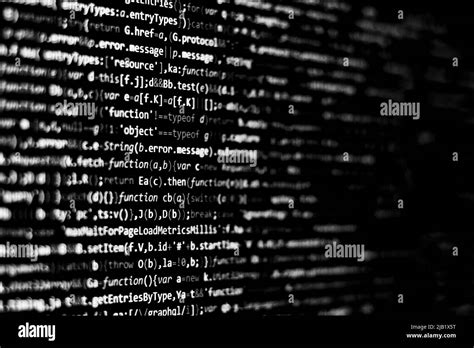 black and white code background javascript code on computer screen