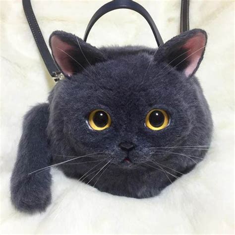 Here are the Cat Bags, some too realistic handbags shaped as cats ...