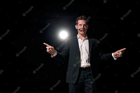 premium photo successful man with microphone speaking at corporate