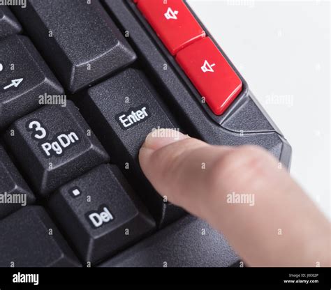 Finger Pushing Enter Button On A Keyboard Of Computer Stock Photo Alamy