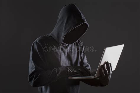 Side View Of Male Hacker With Gloves And Laptop High Quality And Resolution Beautiful Photo