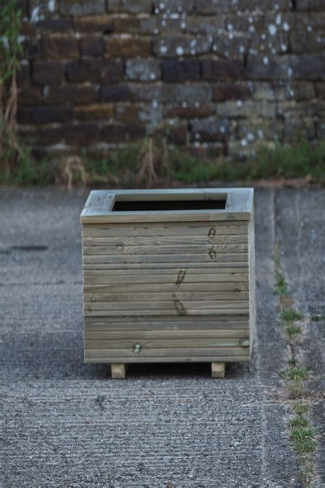 Square Decking Planter With Capping And Trellis On Feet A And M Planters