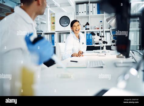 Science Collaboration And Scientists Working In A Laboratory For
