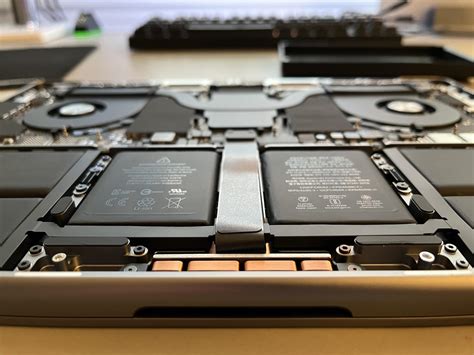 New Inch And Inch Macbook Pro Teardown Photos Reveal Modular I O Ports Pull Tab For Batteries