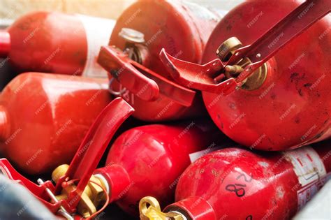 Premium Photo Many Red Fire Extinguishers Are Lying In Stack Fire