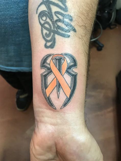 The Meaning Behind Roman Reigns Tattoos Tribal Polynesian And