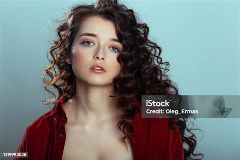 Attractive Brunette With Long Curly Hair Female Fashion Model With Wavy