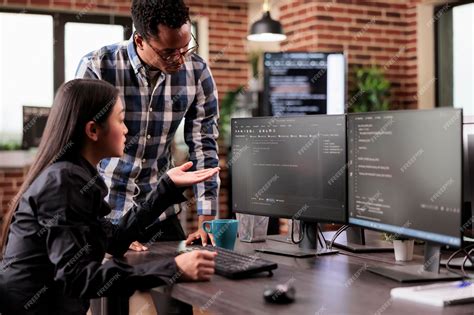premium photo diverse team of system engineers developing html code