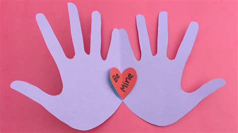 Hand Holding Paper Heart