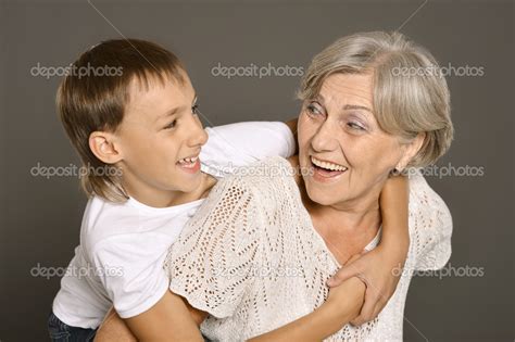 Granny Hugging His Grandson Stock Photo By Aletia