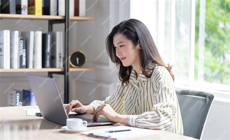Premium Photo Image Of Young Asian Business Woman Working At Office