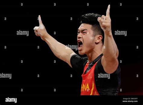 Shi Zhiyong Of China Celebrates After Winning The Gold Medal And Sets A New Olympic Record In