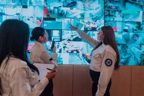 Group Portrait Of Female Security Operator While Working In A Data