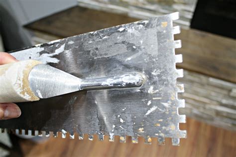 How To Install Stacked Stone Tile On A Fireplace Thrifty Decor Chick Thrifty DIY Decor And