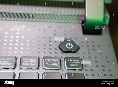 laptop turn on and off power button with green light gaming powerful