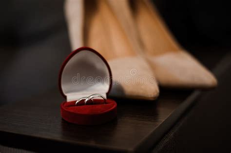 Elegant Wedding Rings Beside Stylish High Heels Stock Image Image Of Handcrafted Jewelry