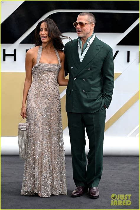 Brad Pitts Girlfriend Ines De Ramon Helps Fix His Clothes On F1