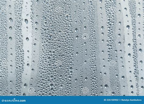 Raindrops On The Window And Blurred Green Background Royalty Free Stock