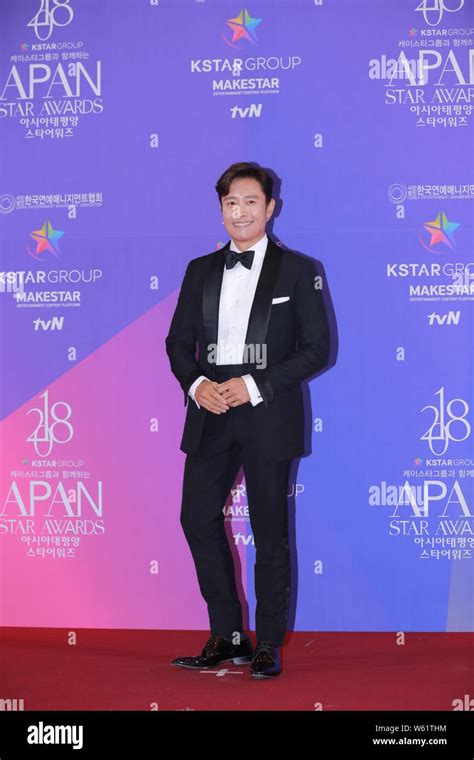 South Korean Actor And Singer Lee Byung Hun Poses As He Arrives On The
