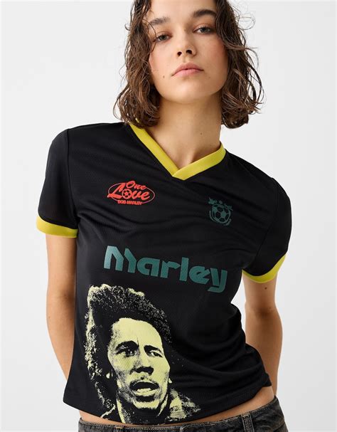 მოკლესახელოიანი მაისური ბობ მარლის პრინტით ქალი Bershka