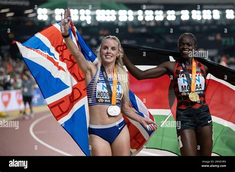 Keely Hodgkinson Celebrating Her Medal With Her Countrys Flag In The