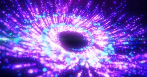 Abstract Purple And Blue Bright Luminous Particles Flying In A Spiral In A Whirlwind Magical