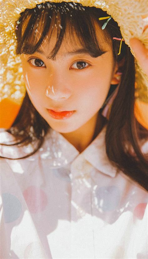 草帽少女阳光下娇俏可人潮范十足唯美写真4493美女图片