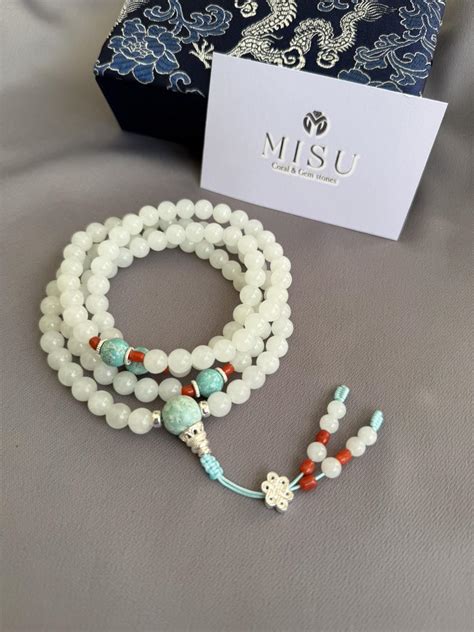 Misu Цагаан хаш чулуун эрхи Монгол Оюу чулуу болон далайн шүртэй Үнэ 8мм хэмжээтэй 1 200