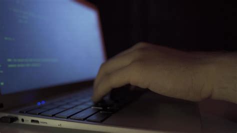 close up hacker hands using laptop 42574237 stock video at vecteezy