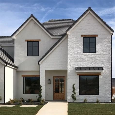 White Stucco House With Stone