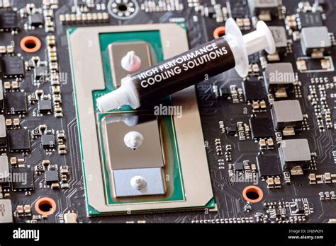 Applying Thermal Grease To Cpu Closeup Stock Photo Alamy