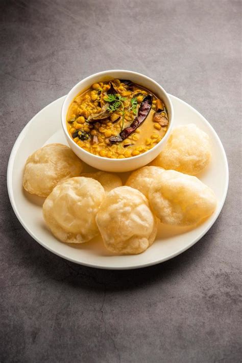 Luchi Cholar Dal Or Fried Bread Made Of Flour Served Along With Curried