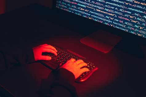 Premium Photo Cyber War Hacker Breaking Security Anonymous Person