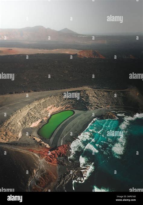 Aerial View Of El Golfo A Scenic Wild Coastline With A Small Inlet And