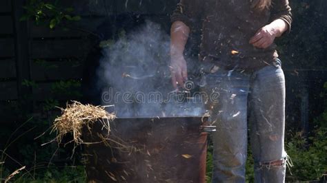 Woman Using A Bin Incinerator To Dispose Of Garbage Stock Footage Video Of Container