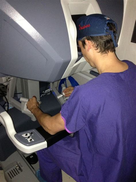 Dr Reid V Graves Working On A Robotic Surgical System The Da Vinci Si Roboticsurgery
