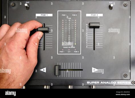 Dj Mixer Close Up With Hand Super Analog With Crossfader Volume Knobs Audiophile Turntableist