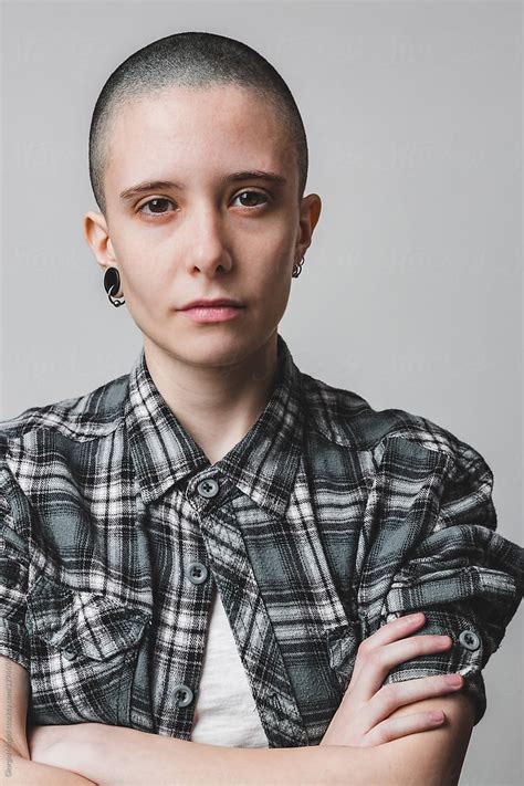 Androgynous Young Woman Posing Tough As A Male By Stocksy Contributor