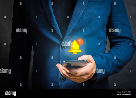 Push Notification Businessman Holding Smartphone With Virtual Yellow