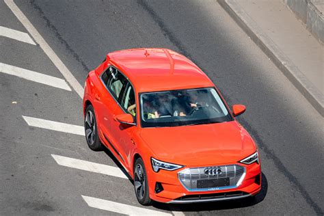 Orange German Battery Electric Midsize Luxury Crossover Audi Q8 Etron