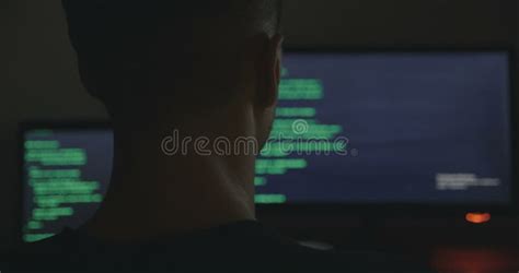it professional hacker programmer is working on computer in cyber