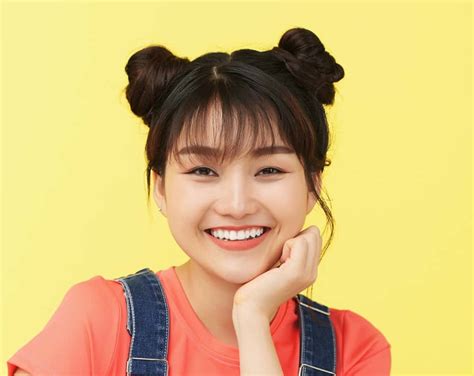 21 Beautiful Ways To Style A Bun With Bangs
