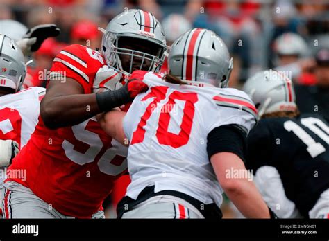 Ohio State Offensive Lineman Joshua Alabi Plays In Their Ncaa College